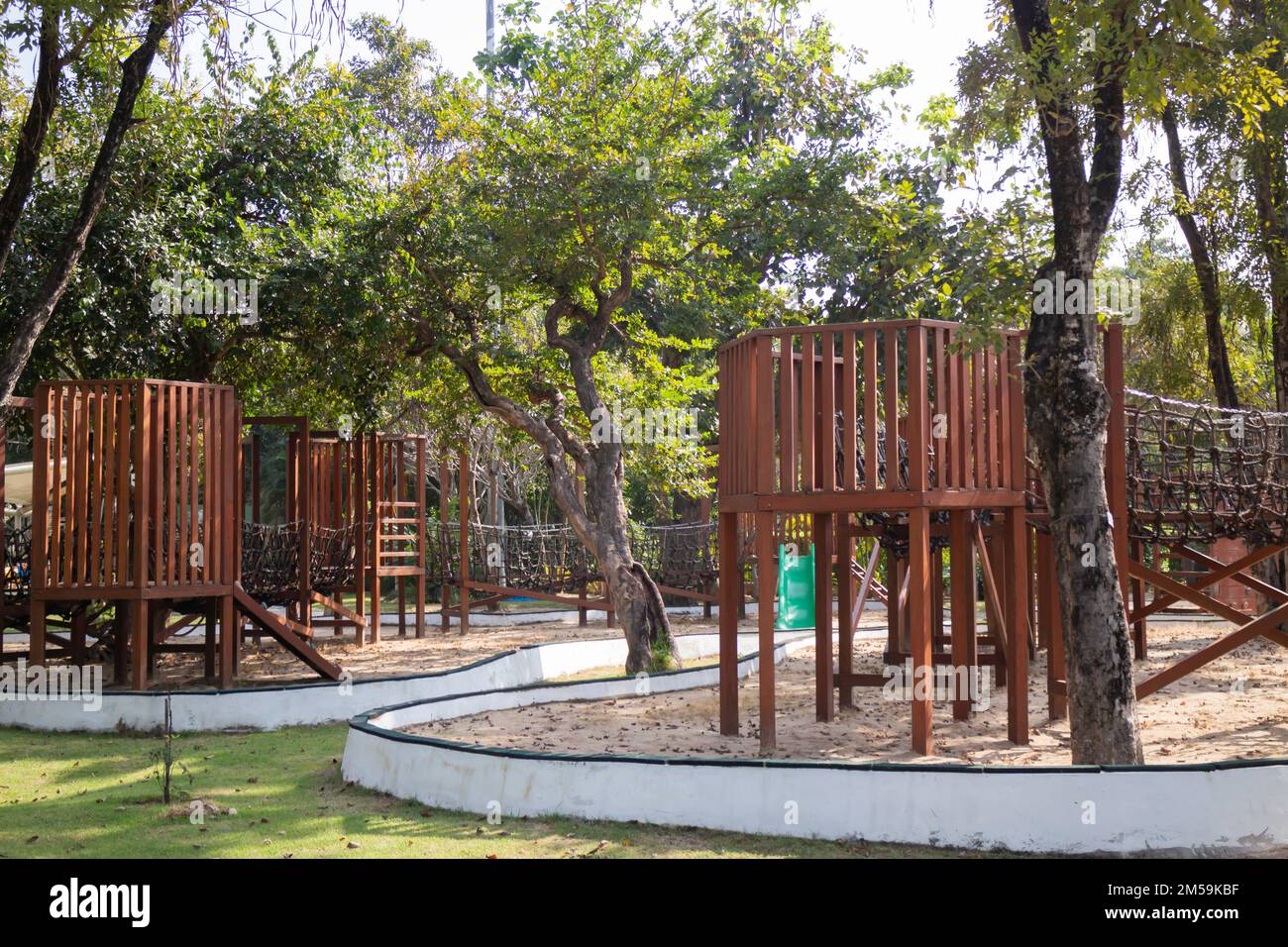 Outdoor playground with green grass ground, stock photo Stock Photo - Alamy
