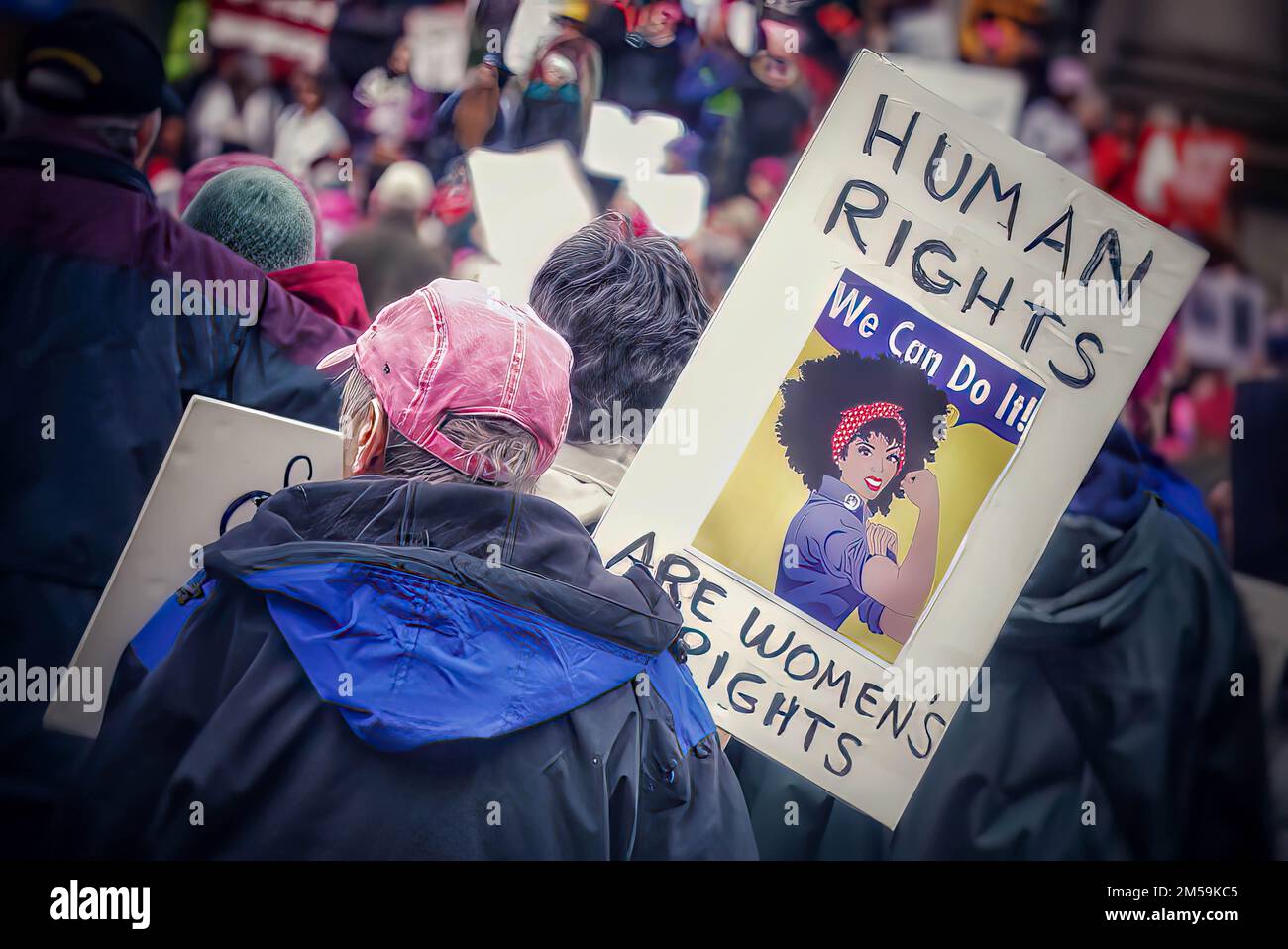 Many women holding signs in protest at the 3rd Annual Woman's March at ...
