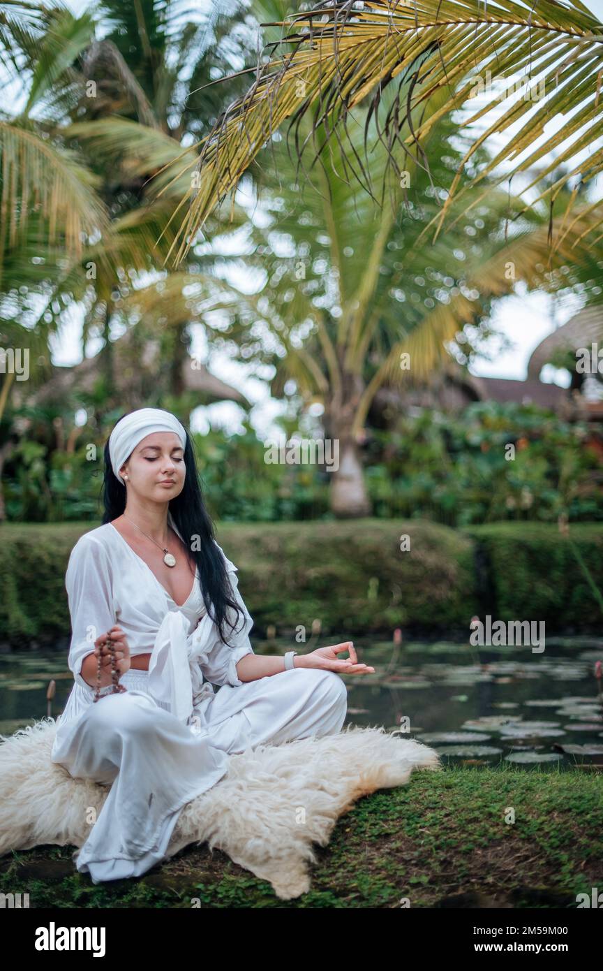 Girl practice yoga meditation outdoor in park Stock Photo - Alamy