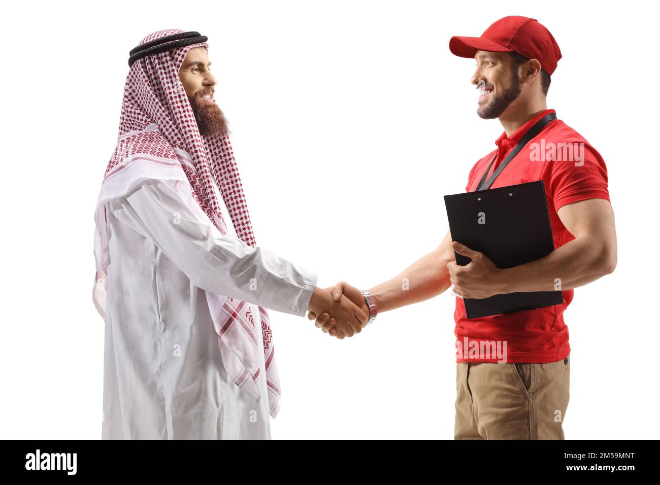 Profile shot of a delivery man shaking hands with a saudi arab man ...