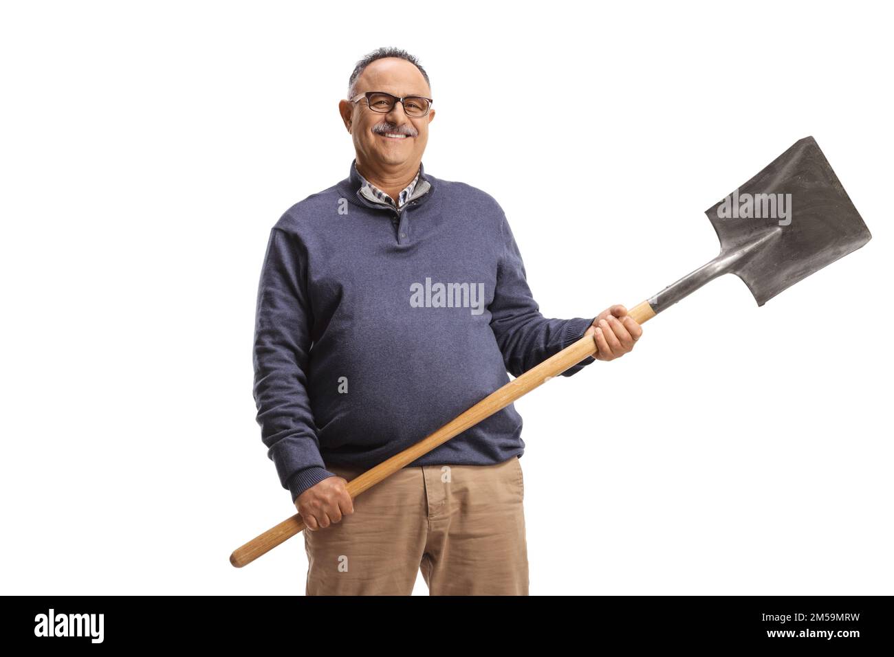 Mature man in casual clothes holding a shovel isolated on white ...