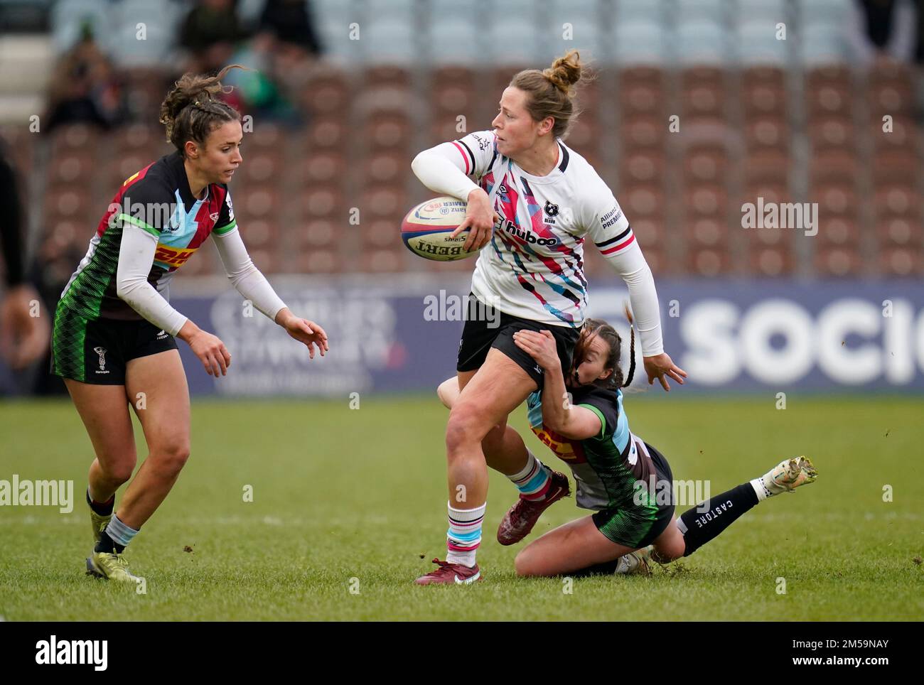 Bristols Bears' Amber Reed (2nd left) is tackled by Harlequins' Lucy ...
