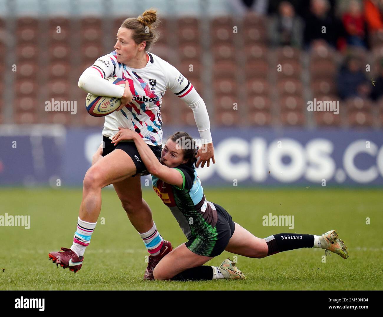 Bristols Bears' Amber Reed (left) is tackled by Harlequins' Lucy Packer ...