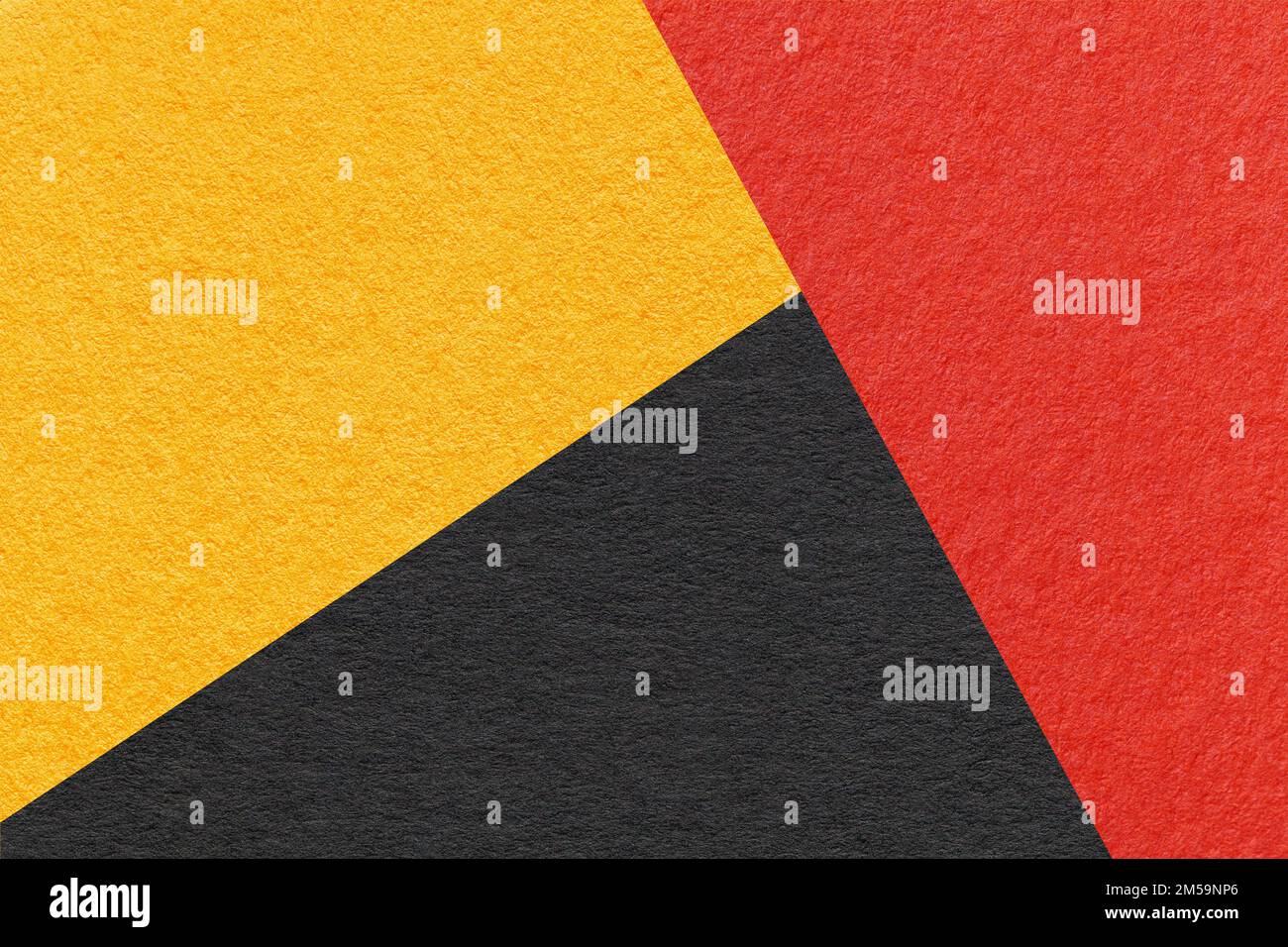 Texture of craft black, red and yellow shade color paper background ...