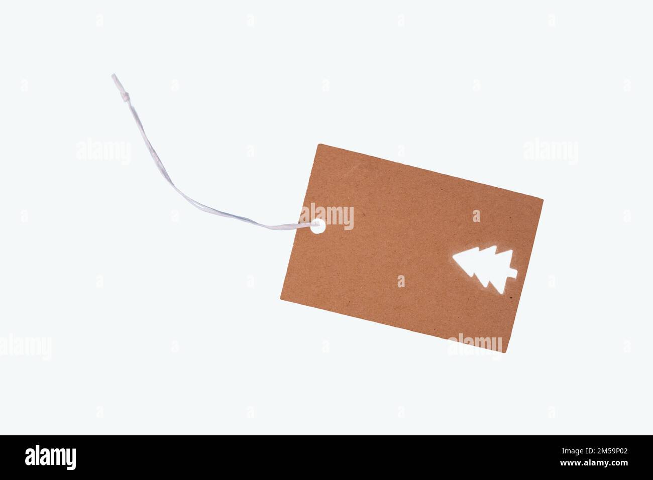 festive christmas tree blank gift label with string isolated on a white ...