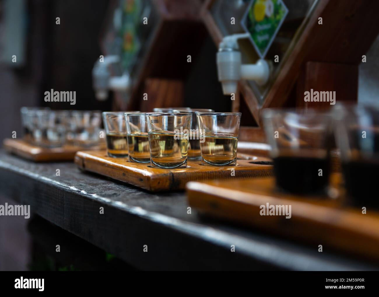Assortment of hard strong alcoholic drinks and spirits in glasses on ...