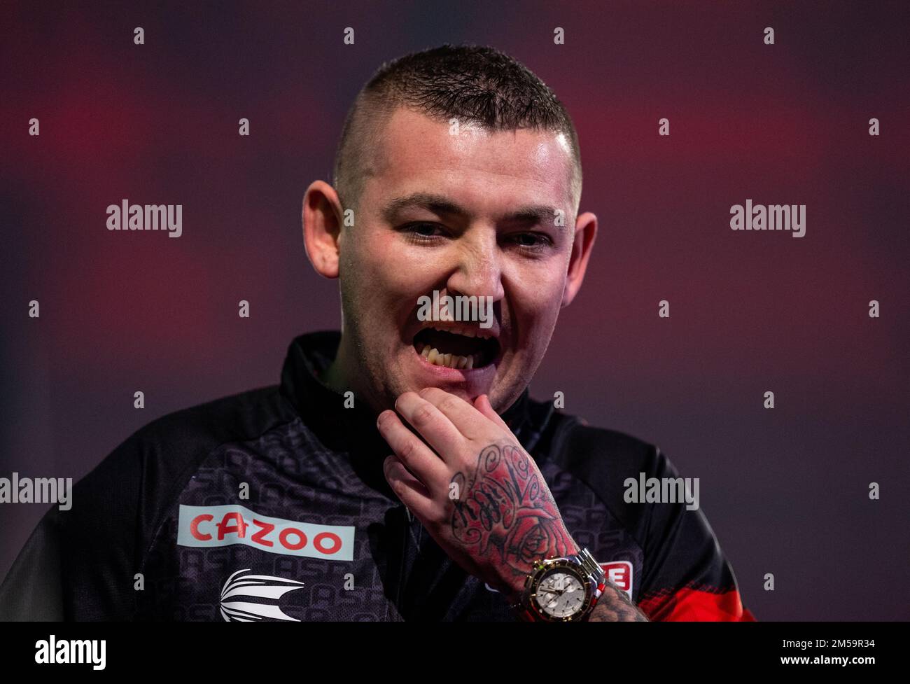 Nathan Aspinall reacting during day ten of the Cazoo World Darts ...