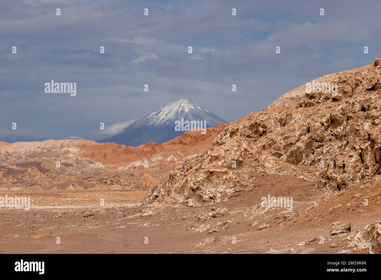 Volcano Lascar in Chile covered by snow seen from Atacama, the driest ...
