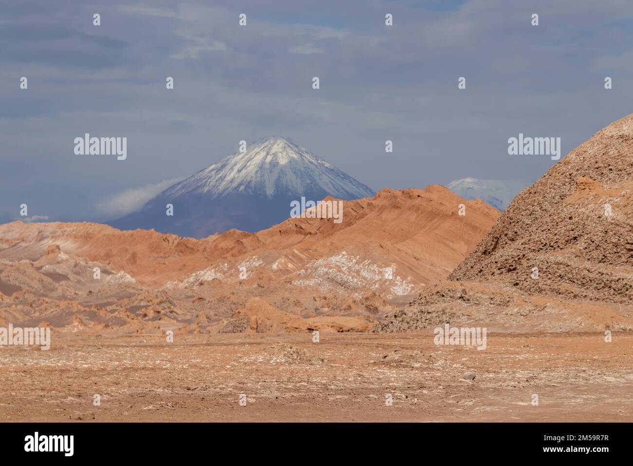 Volcano Lascar in Chile covered by snow seen from Atacama, the driest ...