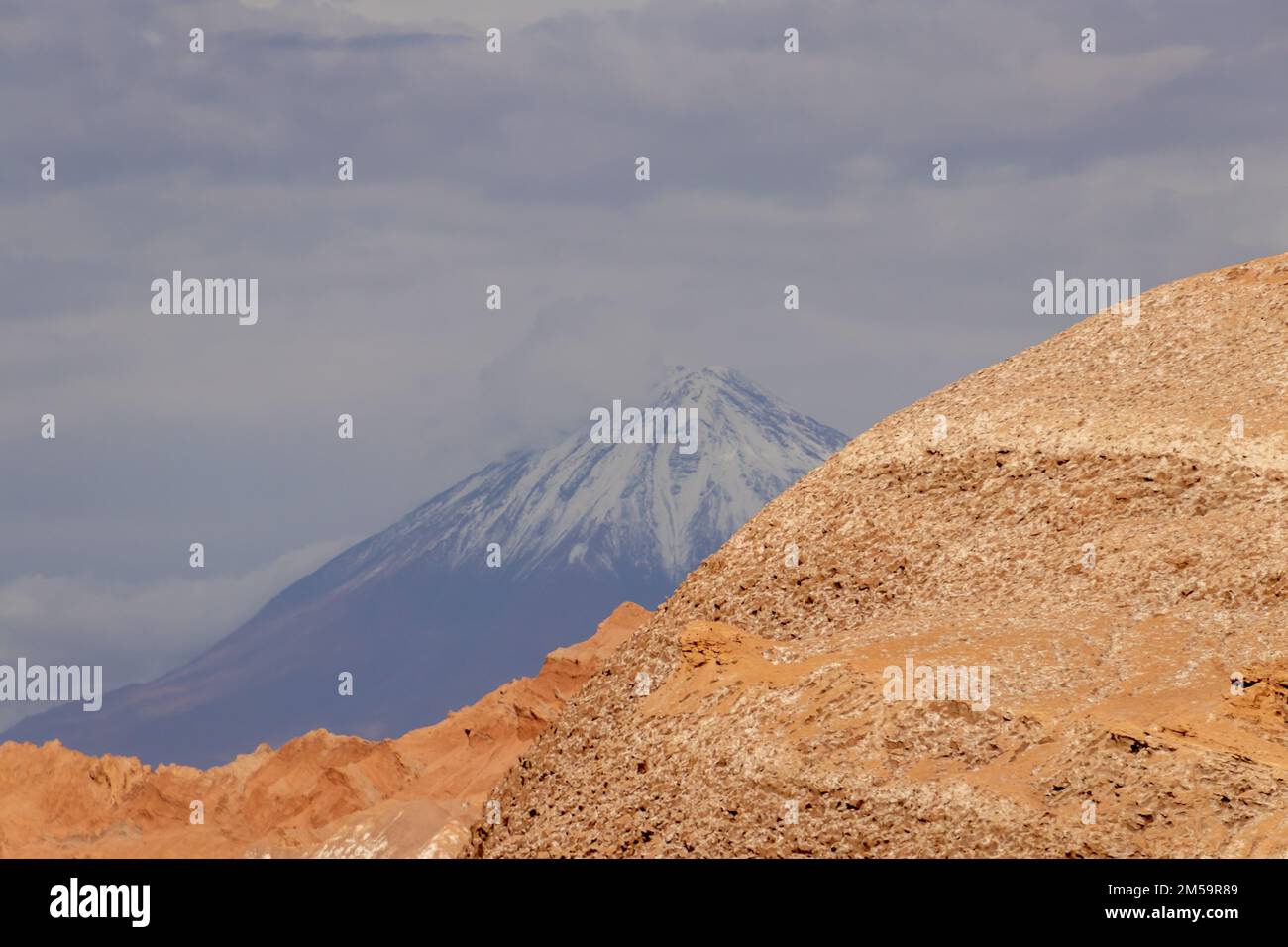 Volcano Lascar in Chile covered by snow seen from Atacama, the driest ...