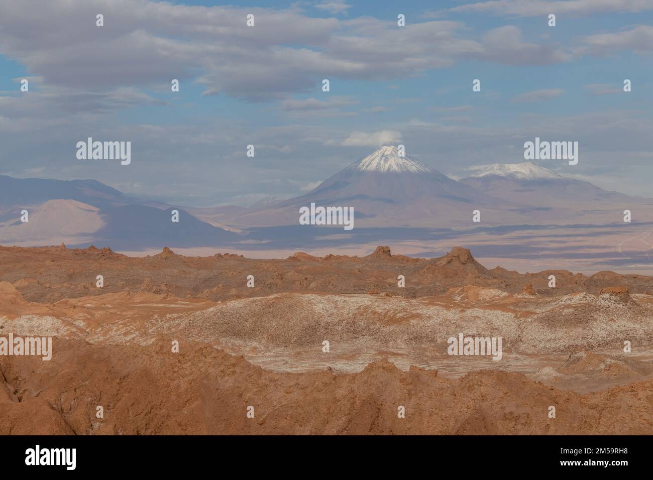 Volcano Lascar in Chile covered by snow seen from Atacama, the driest ...