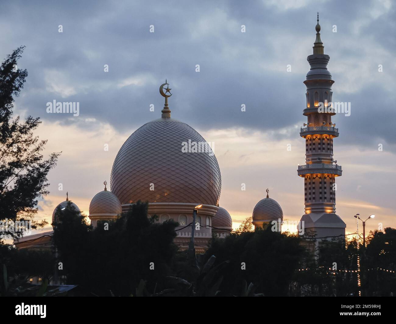 Mosque reflection on water river Stock Photo - Alamy