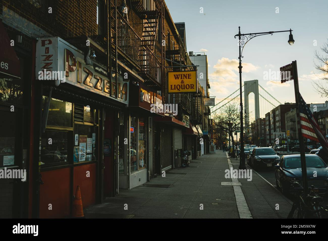 Businesses on 5th Ave and view of the Verrazano-Narrows Bridge, Bay ...