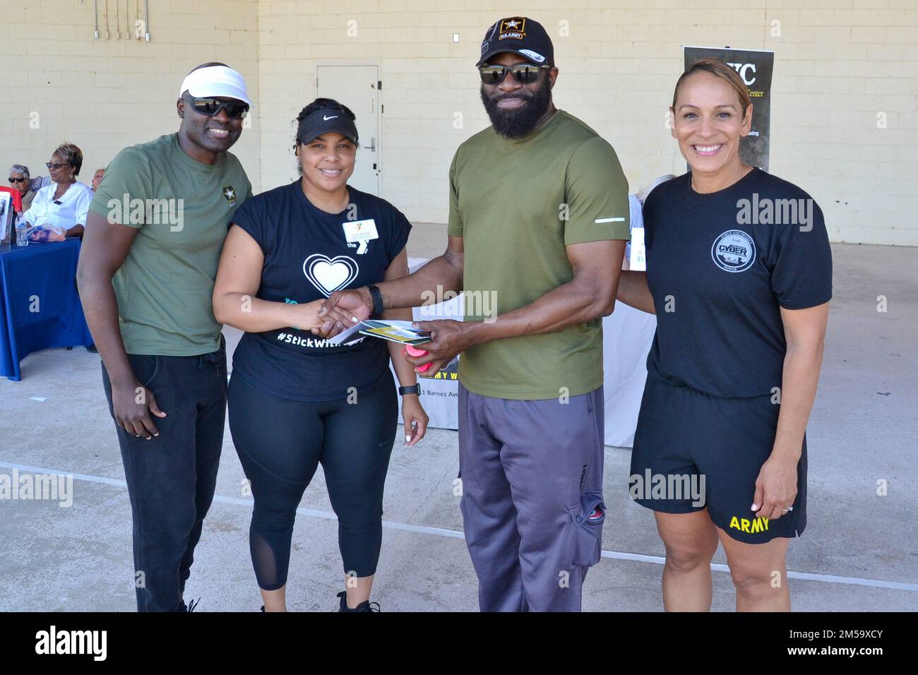 Mr. Gerald Evans is presented a YMCA gym membership for winning ...