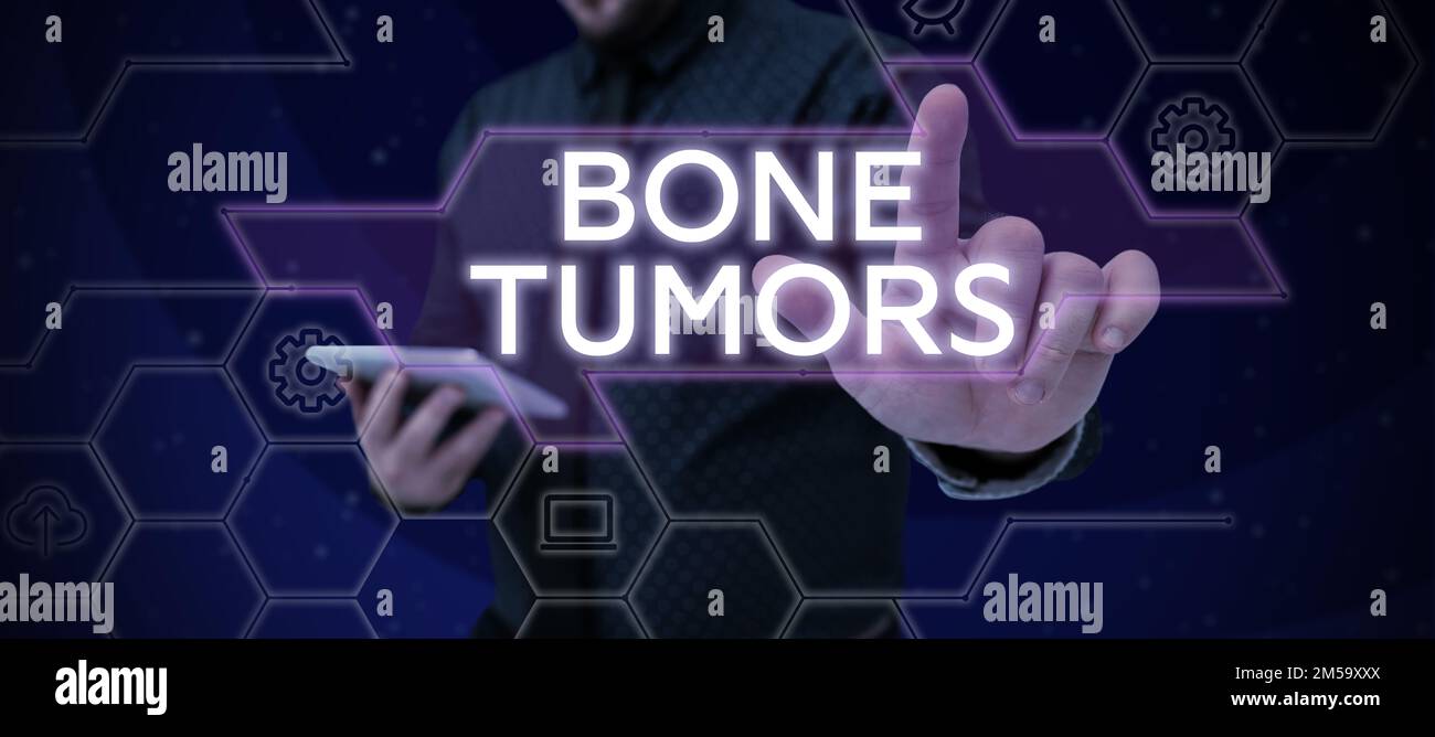 Hand writing sign Bone Tumors. Concept meaning can be either benign or ...