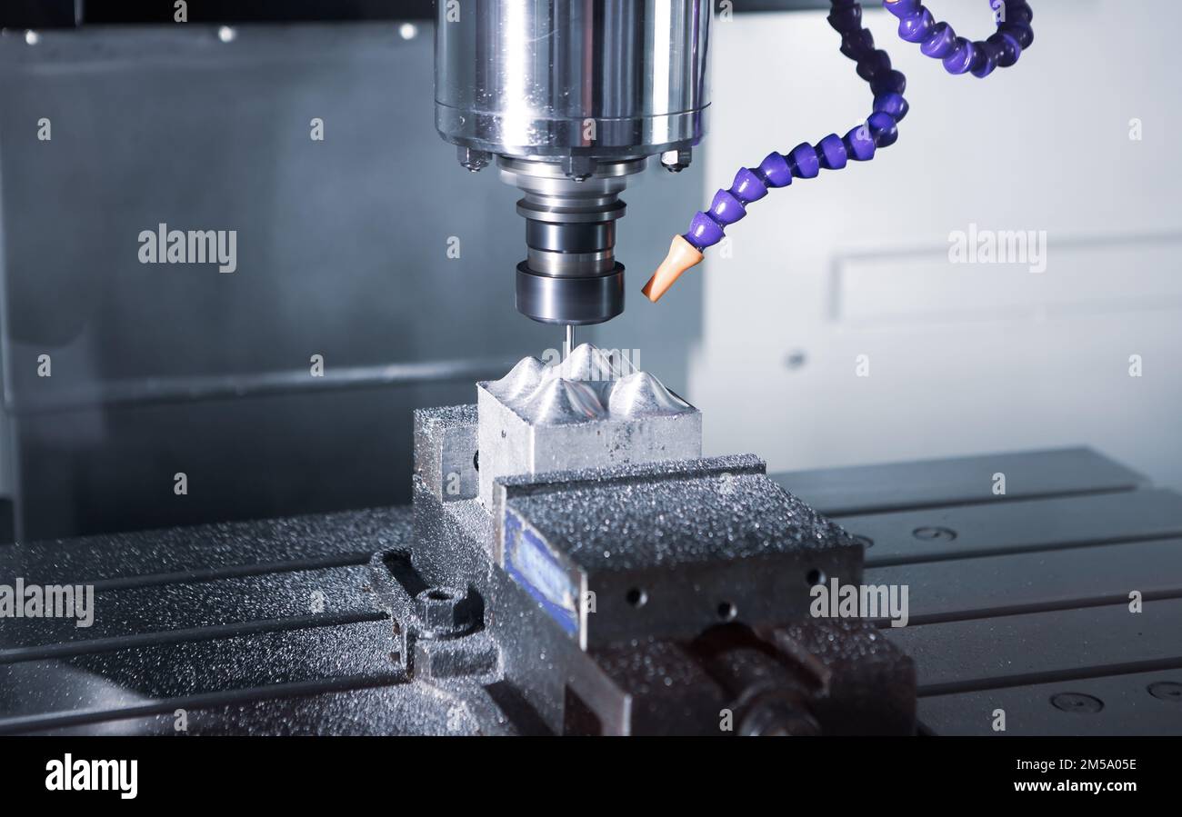 High precision CNC milling machine cutting plastic workpiece ...