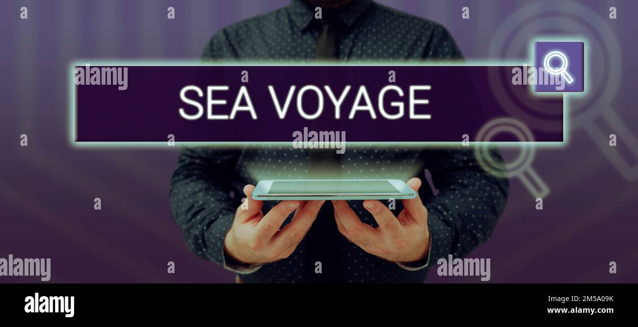 Sign displaying Sea Voyage. Word Written on riding on boat through ...
