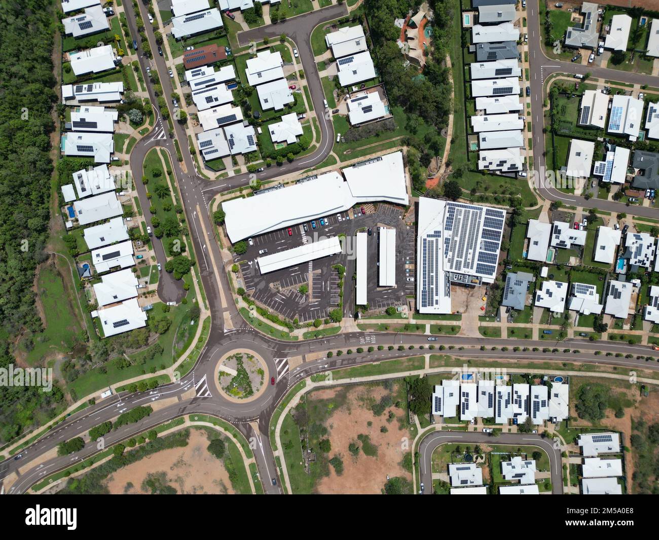 an Aerial View of a residential area with streets and houses with white ...
