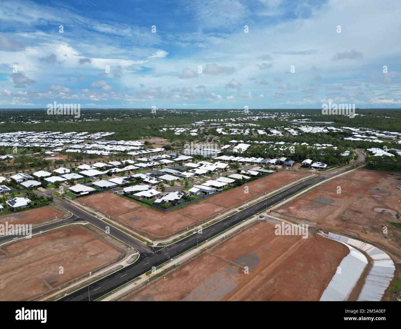 an Aerial View of a residential area with streets and houses with white ...