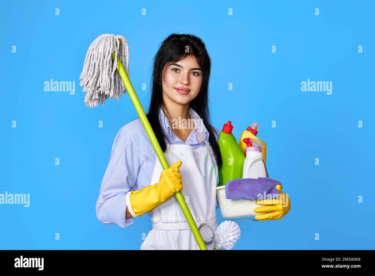 Woman washing clothes in bucket hi-res stock photography and images - Alamy