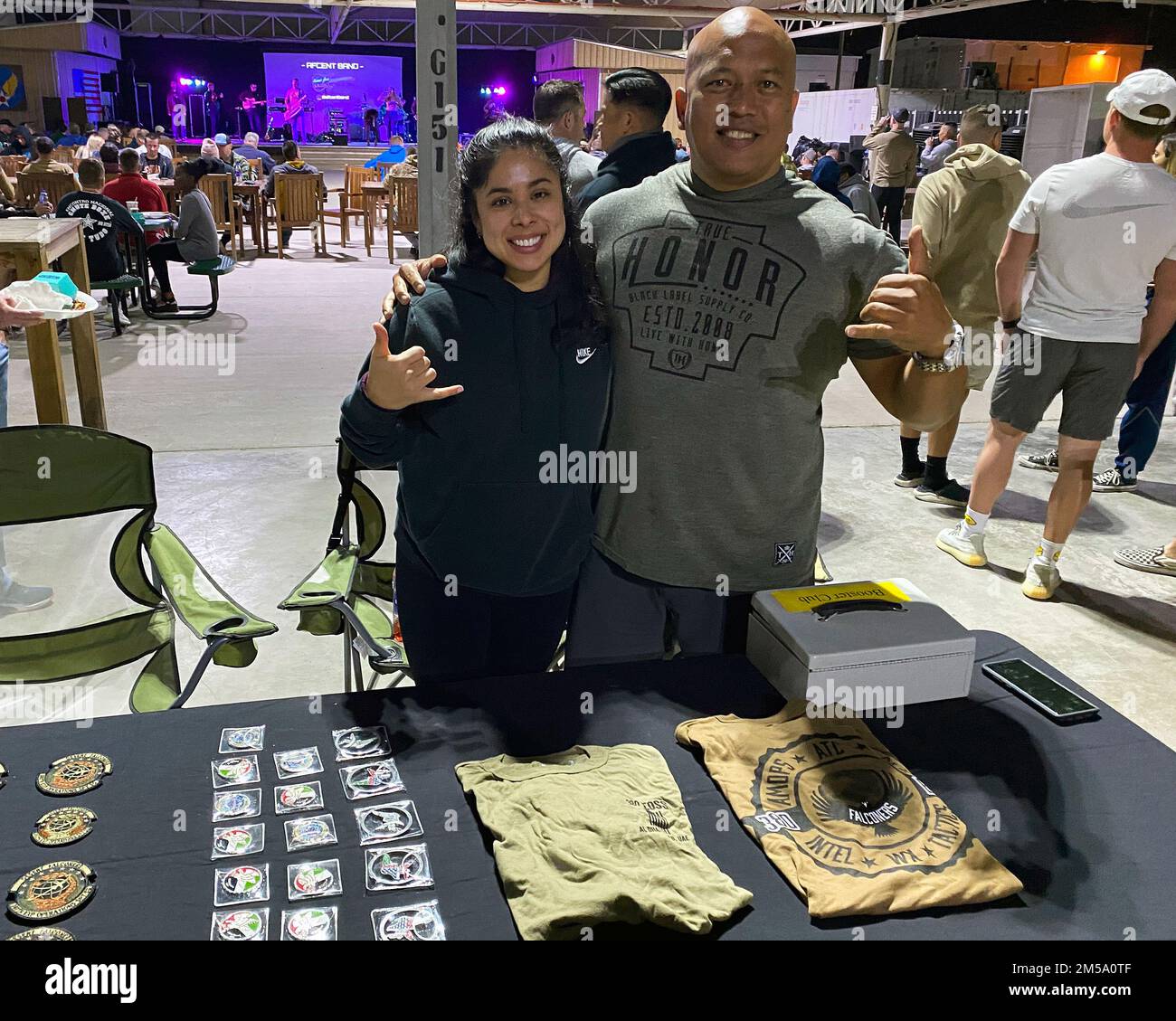 Tech. Sgt. Carla Hudson and Master Sgt. Galen Ho stand with a variety ...