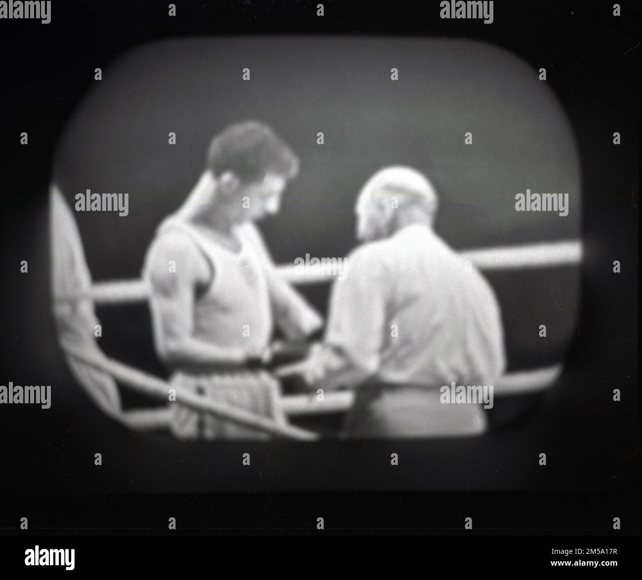 Late 1950s, historical, a television set of the era showing a boxing ...