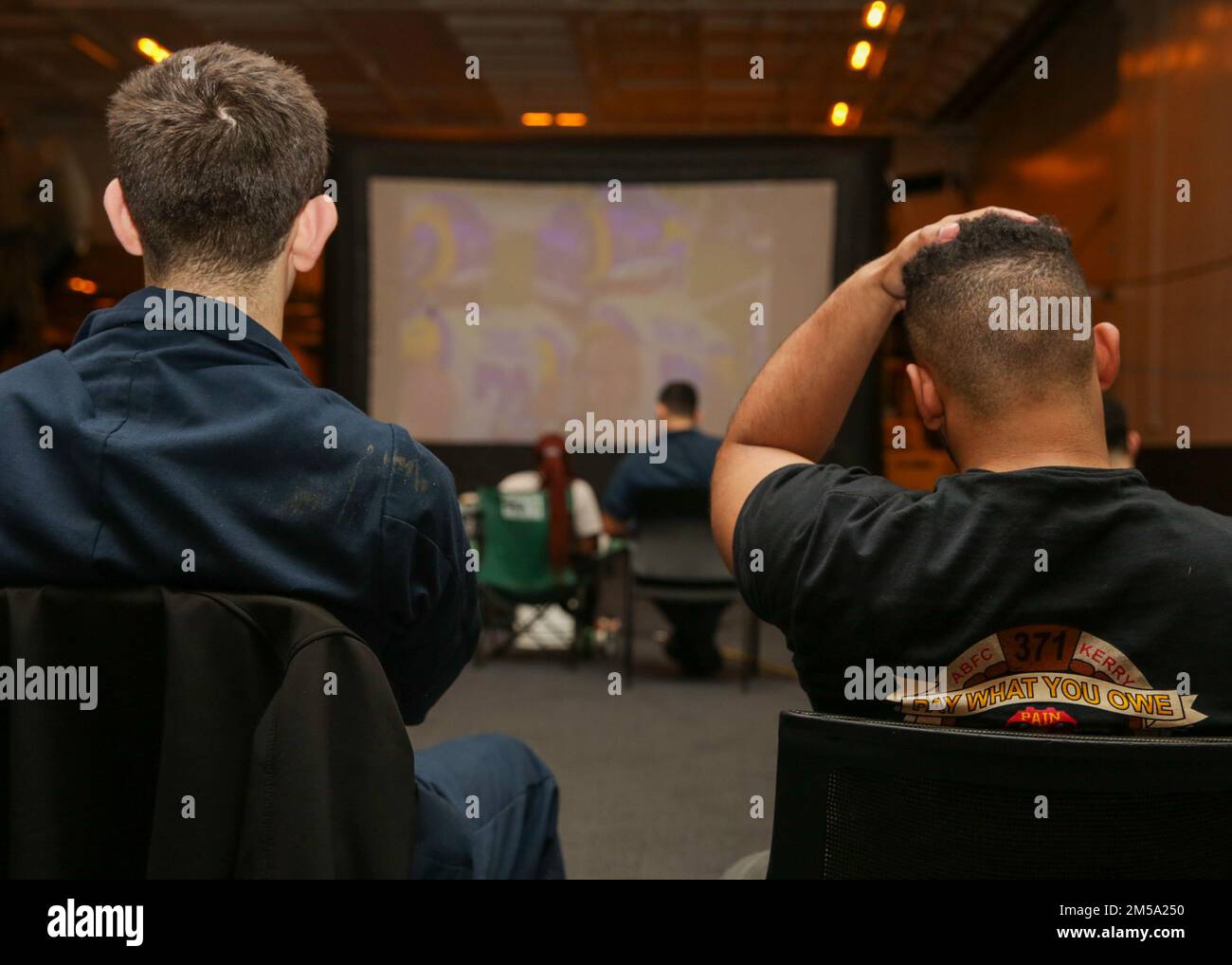 PHILIPPINE SEA (Feb. 14, 2022) Airman Payton Decker, left, from Des ...