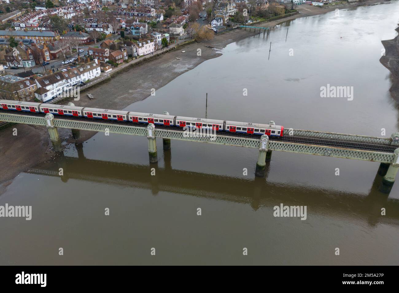 Aerial view of Kew Railway Bridge over the River Thames, with a London ...