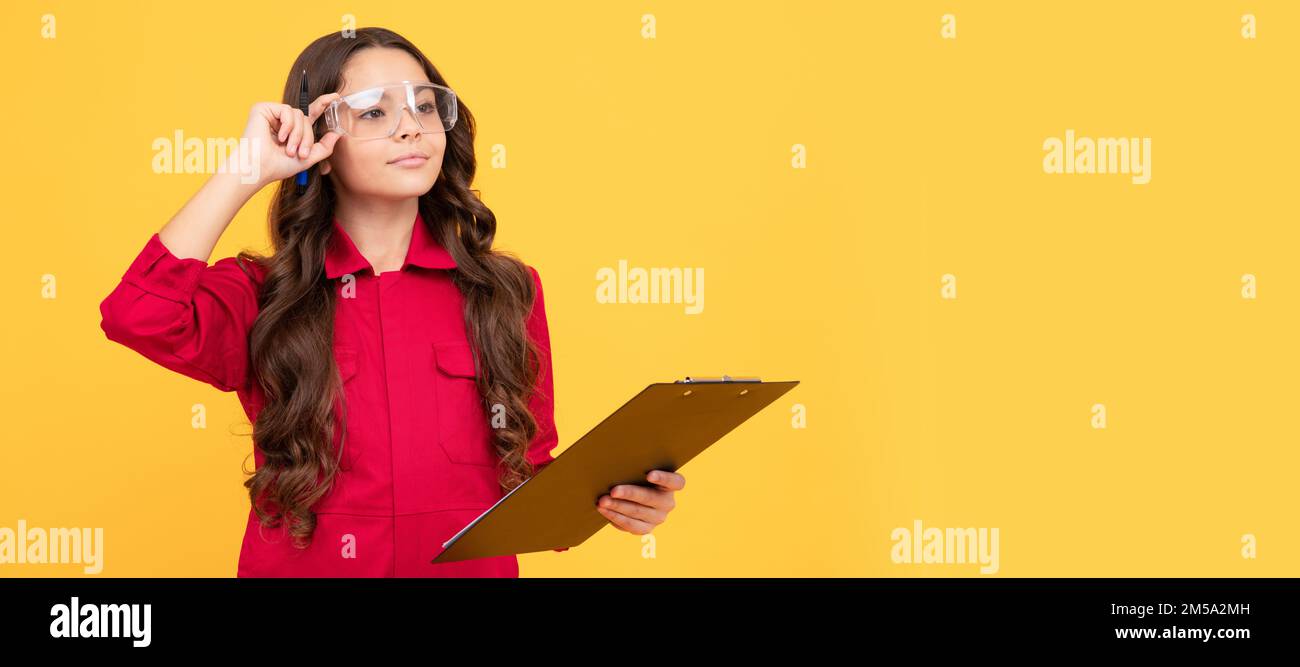 for better look. child wear eyeglasses. eye protection. kid make notes ...