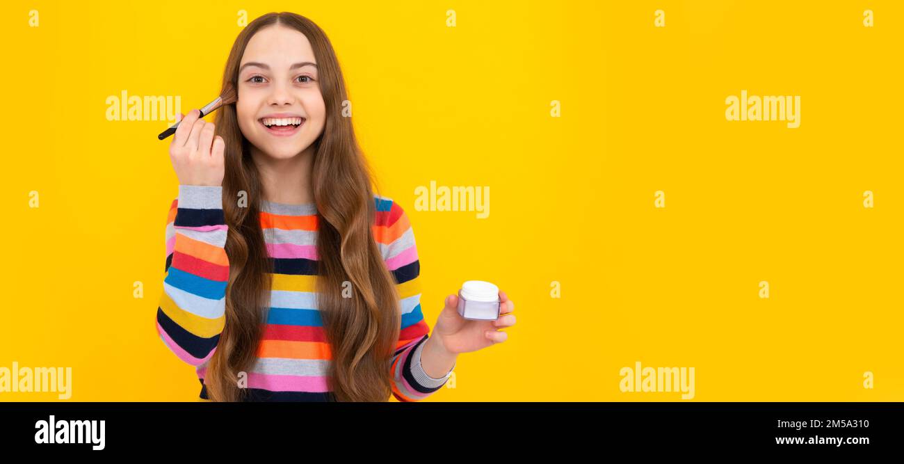 Makeup for every day fun. Happy girl apply foundation. Child smile ...