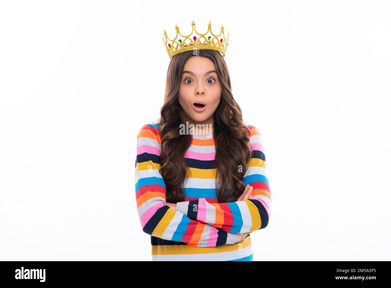 Portrait of ambitious teenage girl with crown, feeling princess ...
