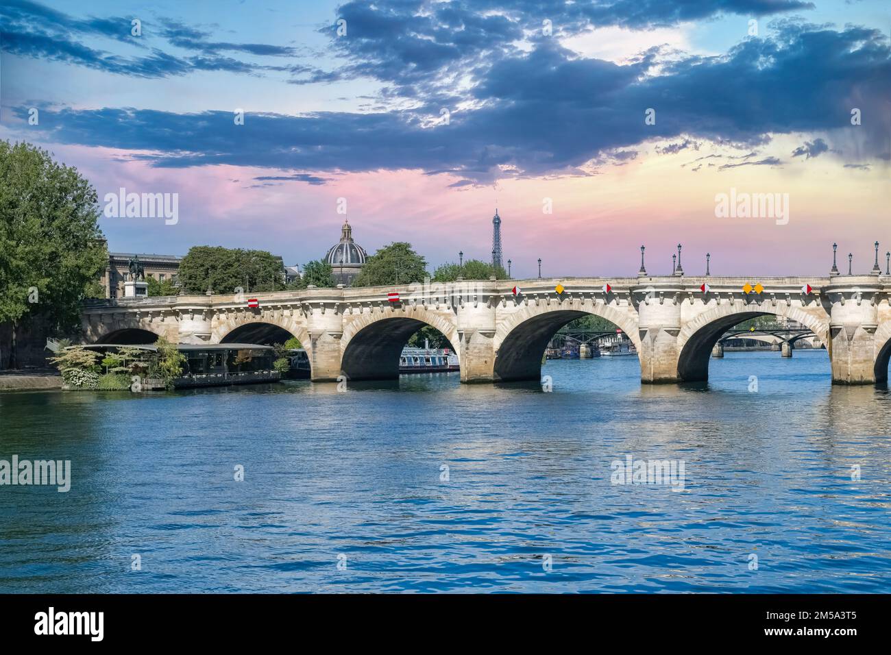 Paris, the Pont-Neuf on the Seine, typical view, with the dome of the ...