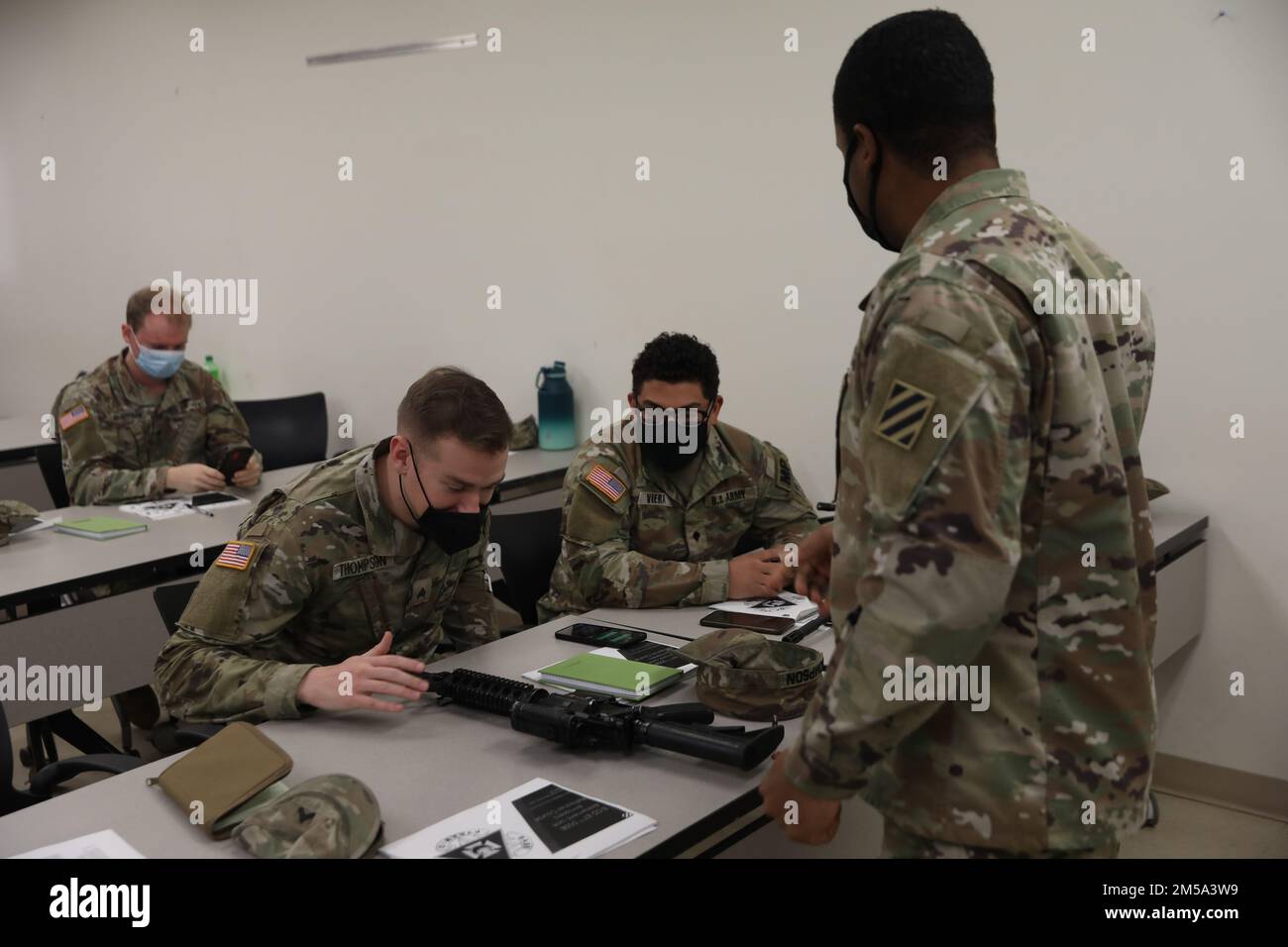 Soldiers assigned to the 3rd Infantry Division, conduct armorer’s ...