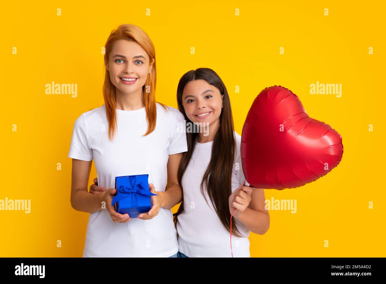 Mothers day celebration. Best mom. Child daughter give gift box to ...