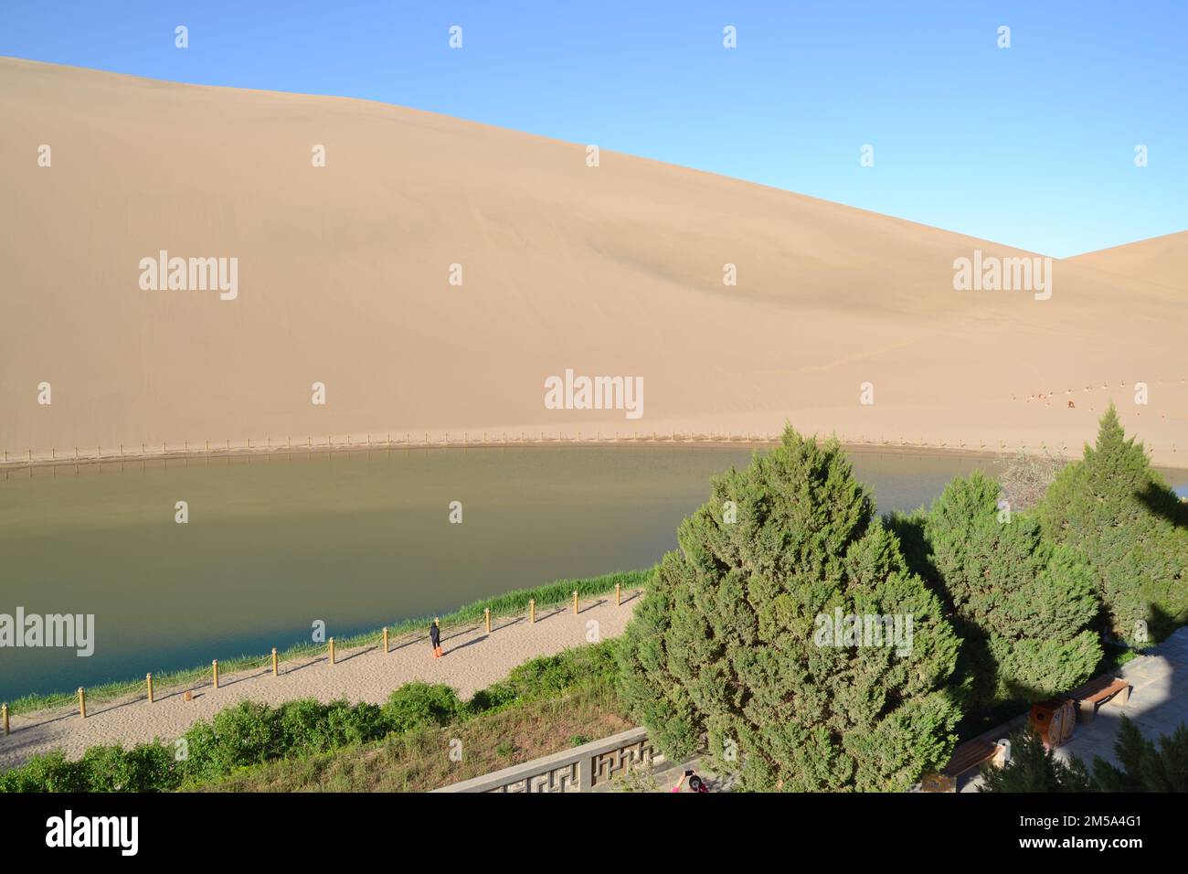 A drone view of the beautiful nature scene of Mingsha Mountain and ...