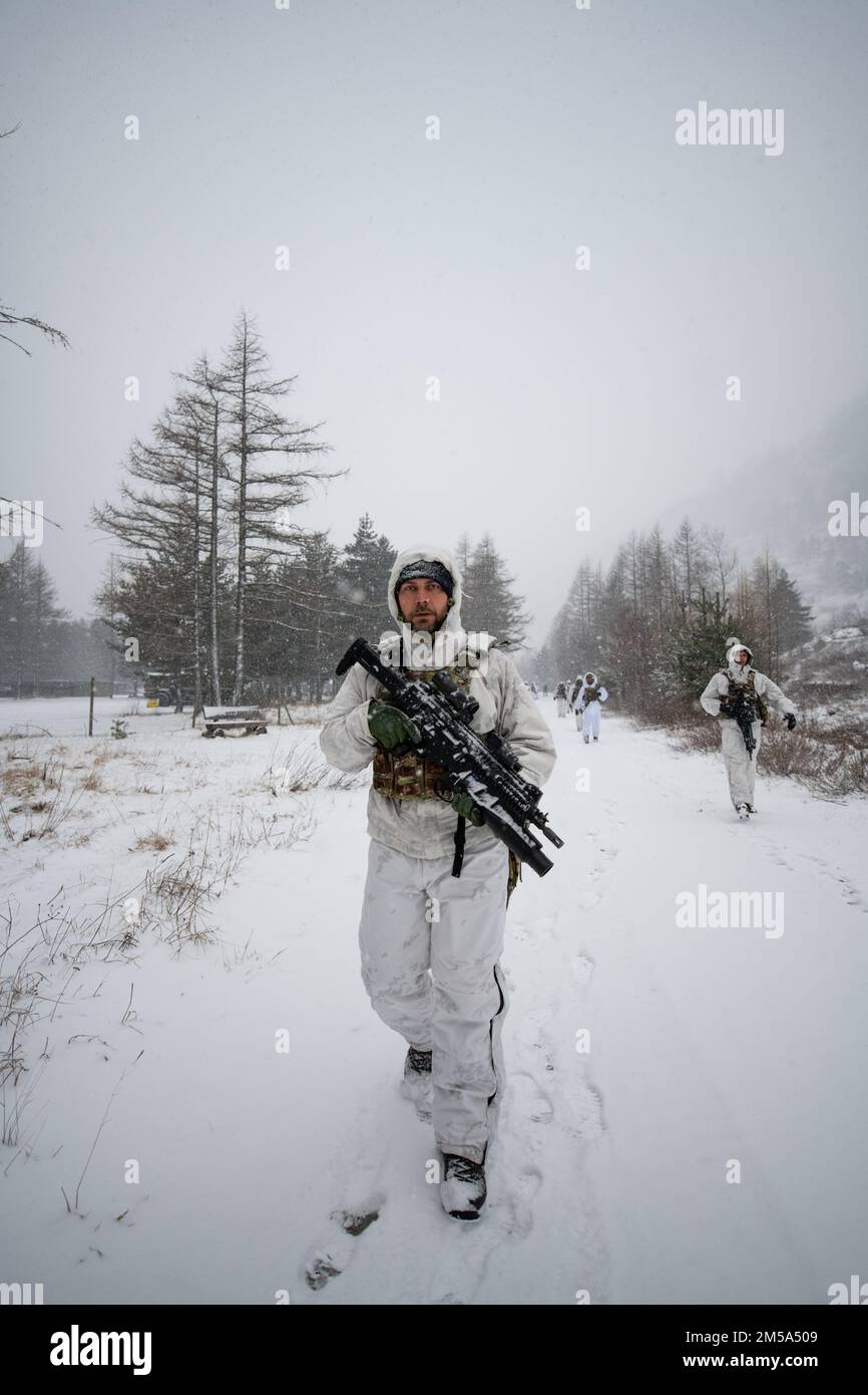 An Italian soldier from the 3rd Alpini Regiment moves in a tactical ...