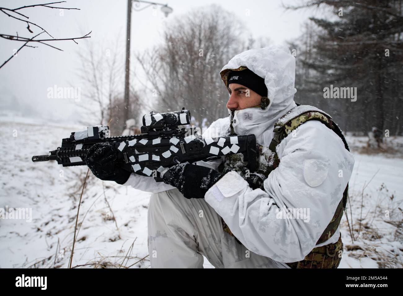 An Italian soldier from the 3rd Alpini Regiment provides security ...