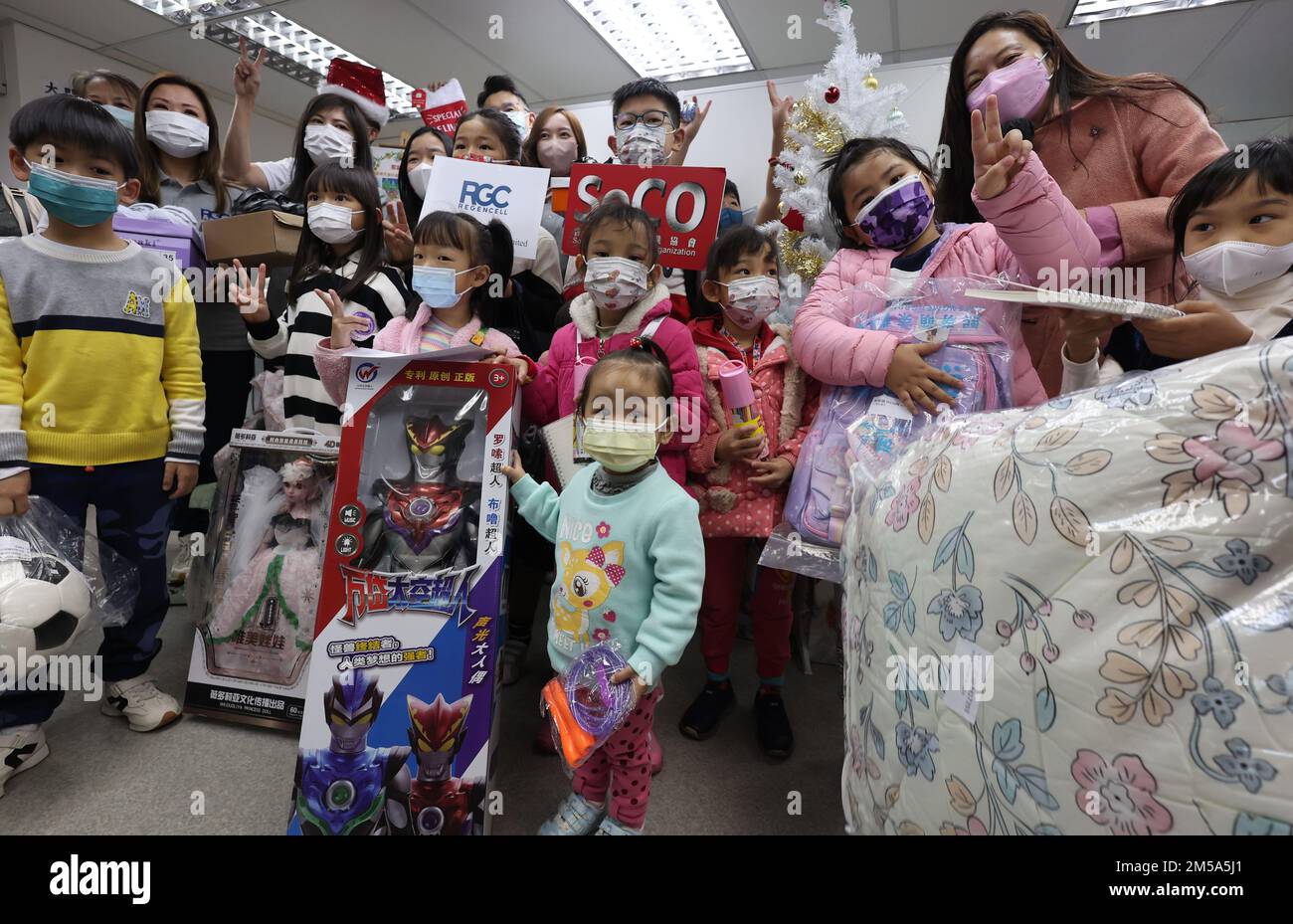 Society for Community Organization (SoCo) handing out Christmas gifts ...