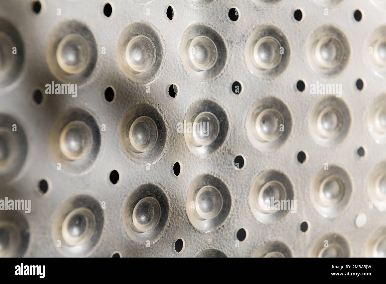 Details of the patterns that form on the floor grid of a Volkswagen ...