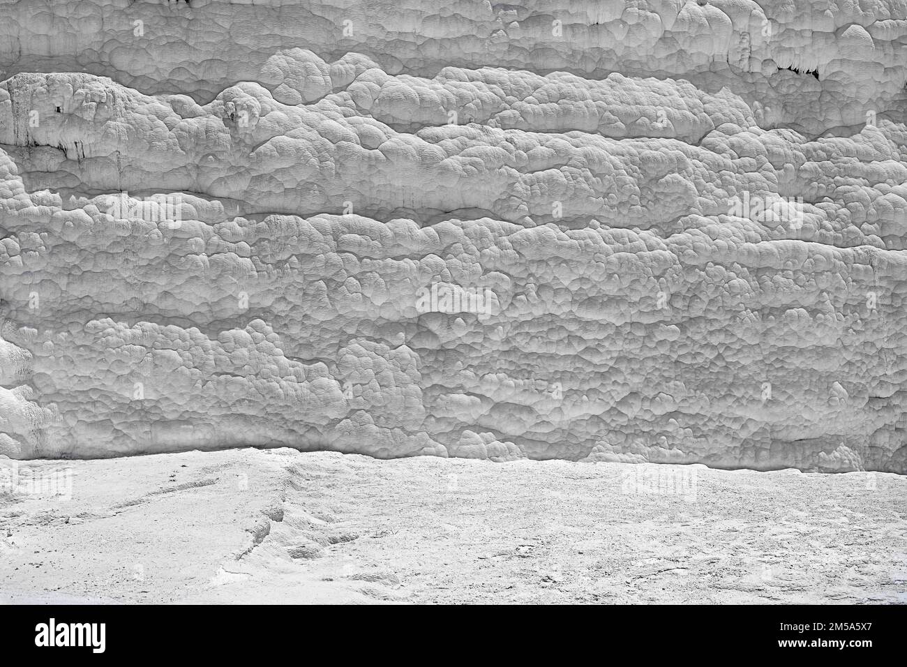 View of natural travertine pools and terraces in Pamukkale on a summer ...