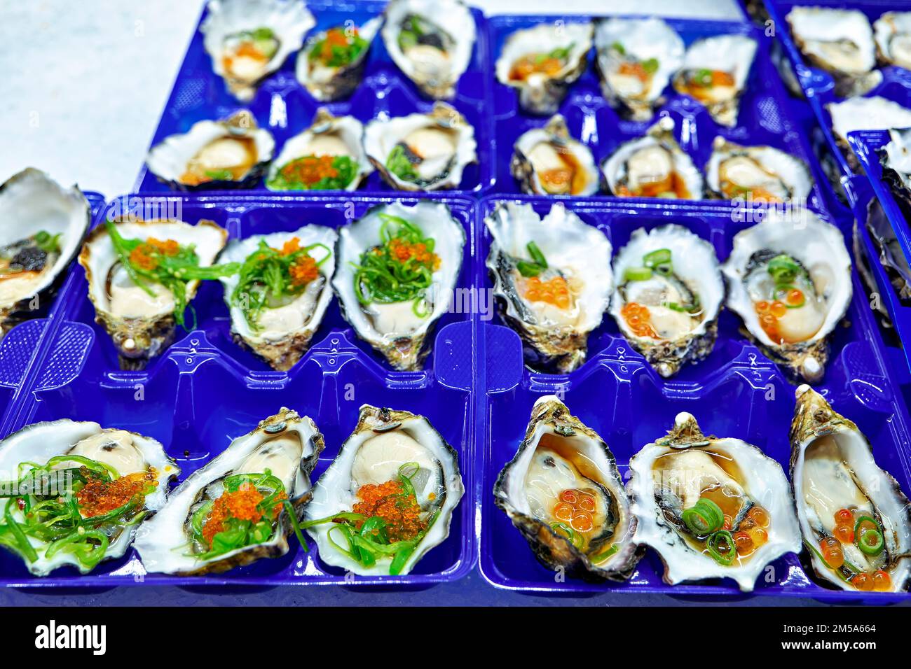 Jumbo pacific oysters hi-res stock photography and images - Alamy