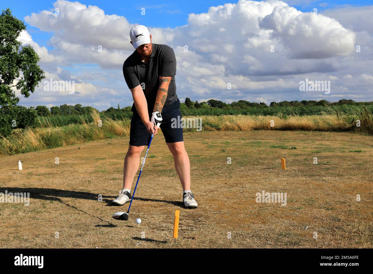 Golfer on the Old Nene Golf & Country Club, near Ramsey town ...