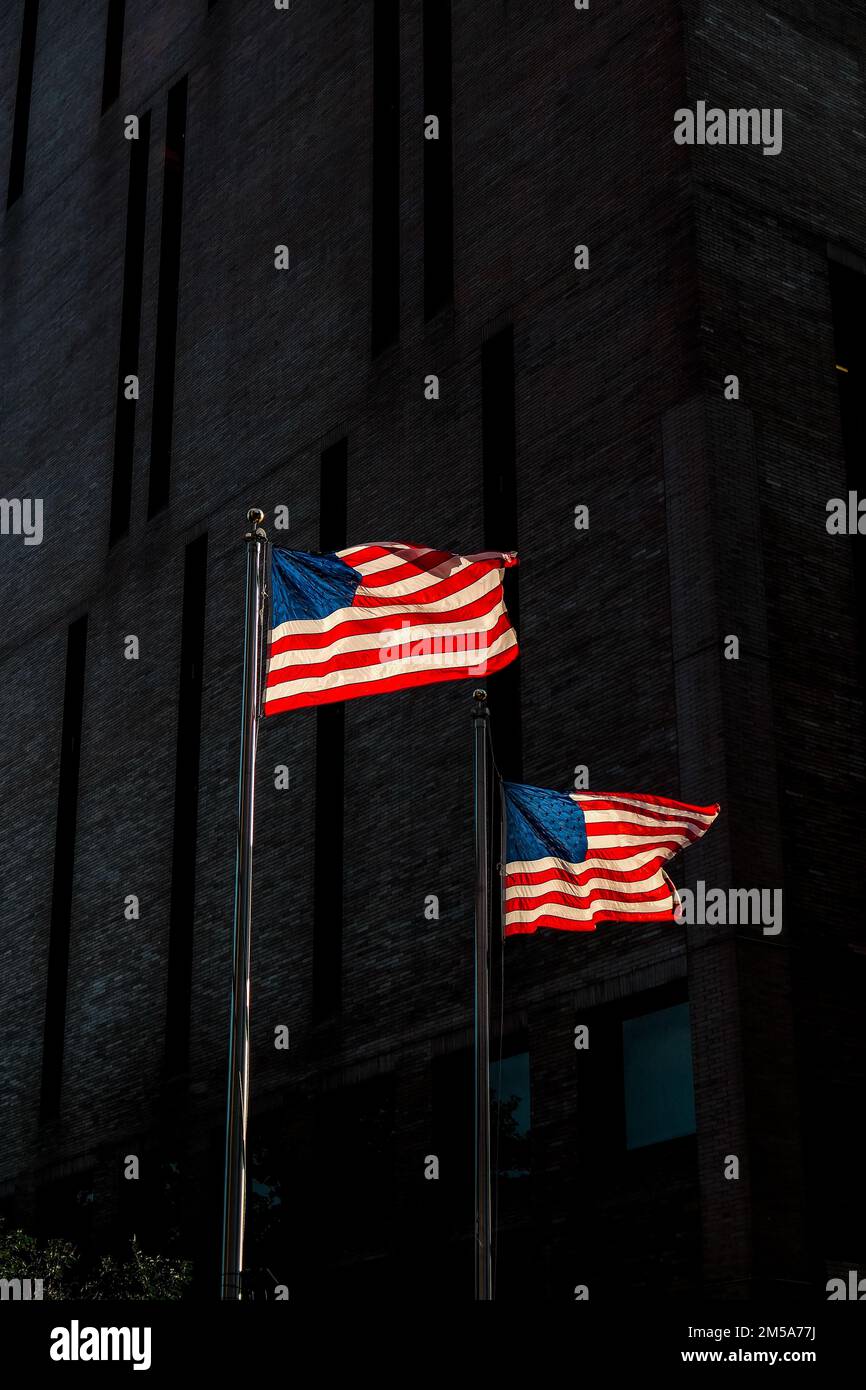 Two American flags waving in New York Stock Photo - Alamy