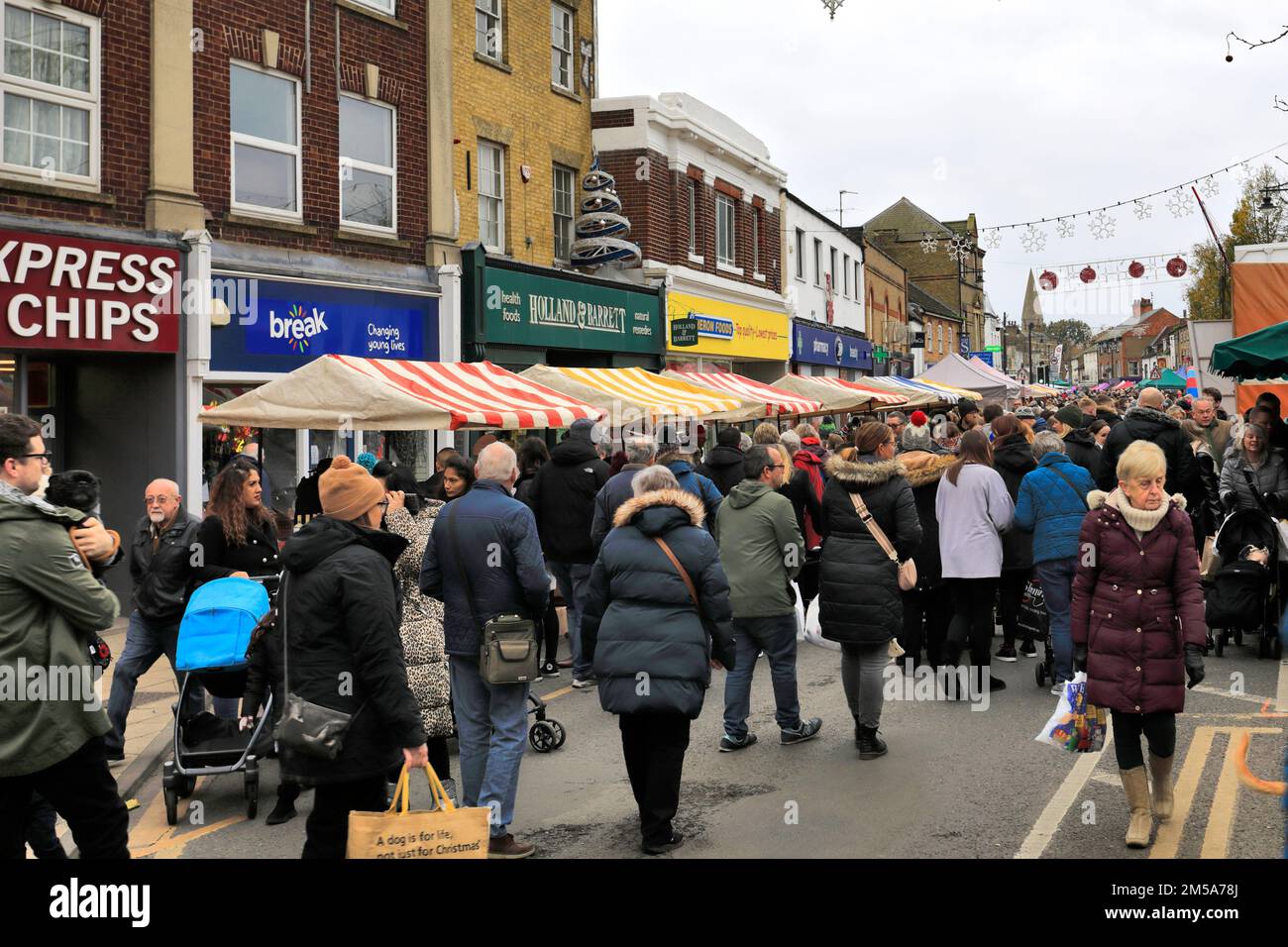 People at the March town Xmas market, Fenland, Cambridgeshire, England ...