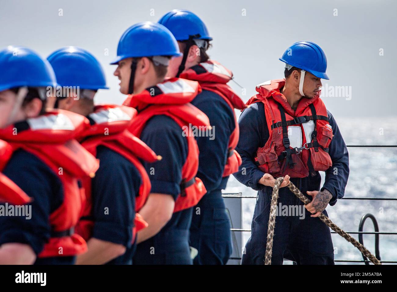Seaman Darren Carrillo, right, from Atlantic City, New Jersey, makes up ...