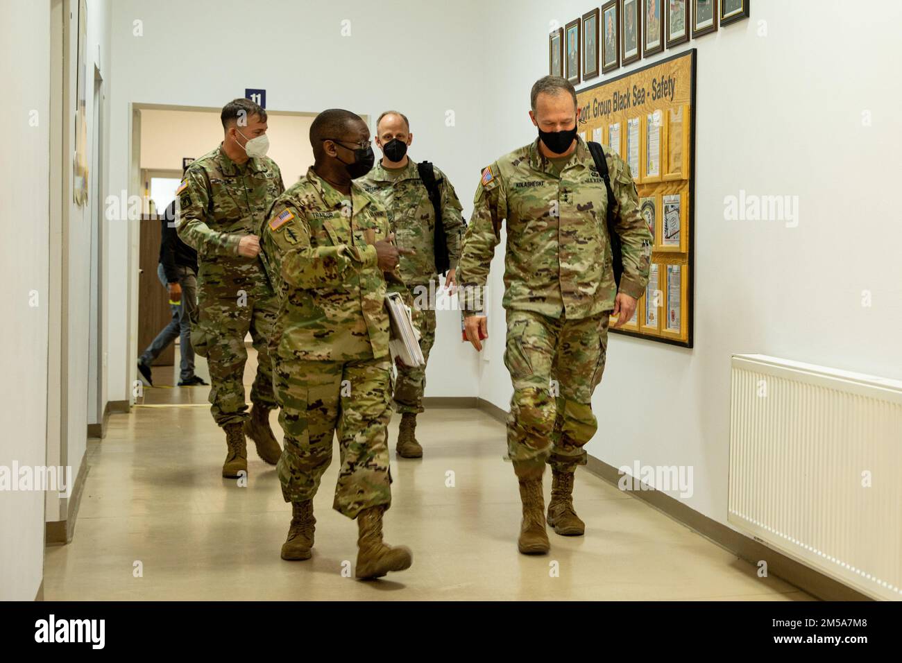 U.S. Army Col. Kendrick D. Traylor, left, commander of Area Support ...