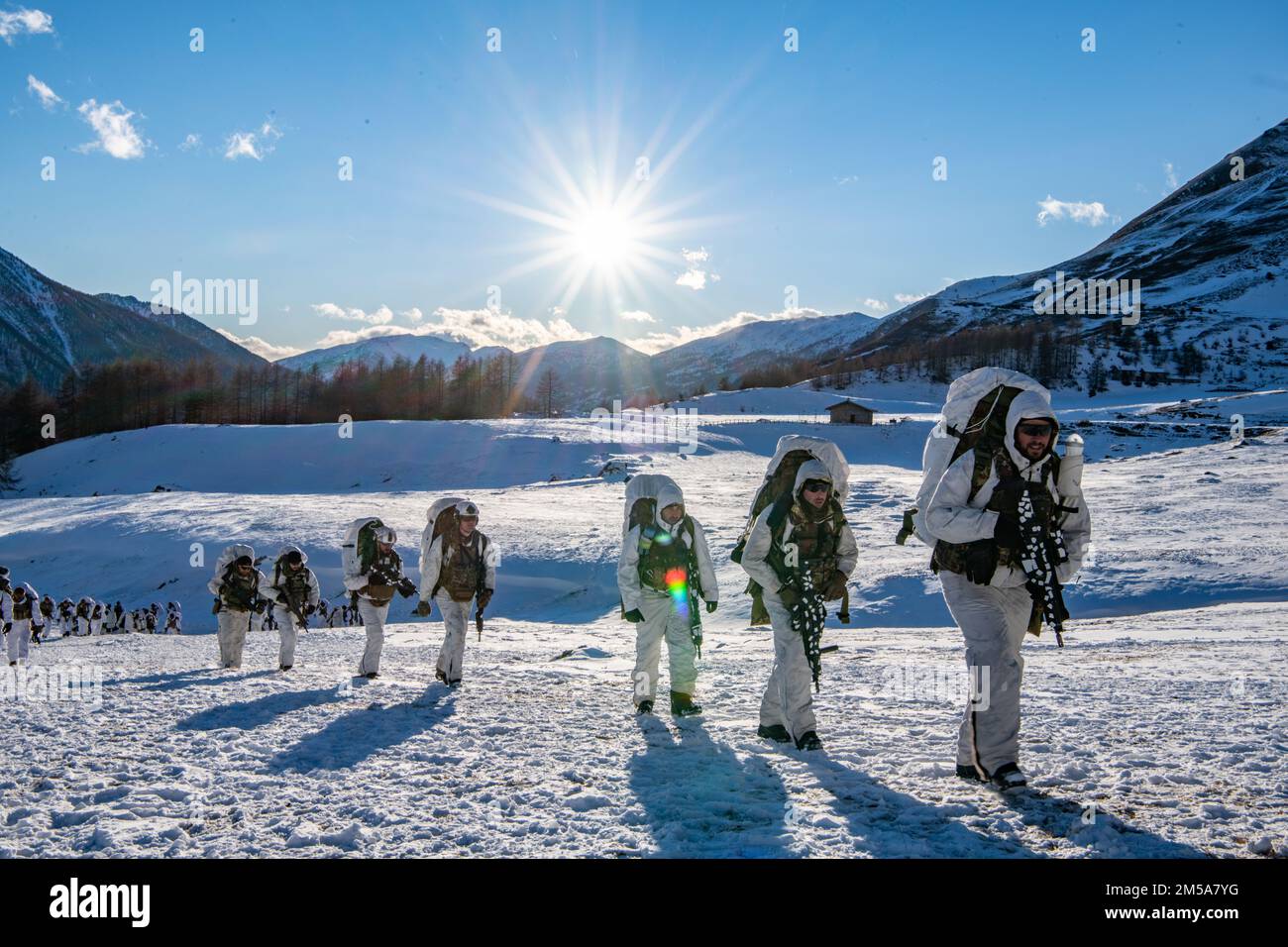 Italian soldiers from the 3rd Alpini Regiment ascend a mountain ...