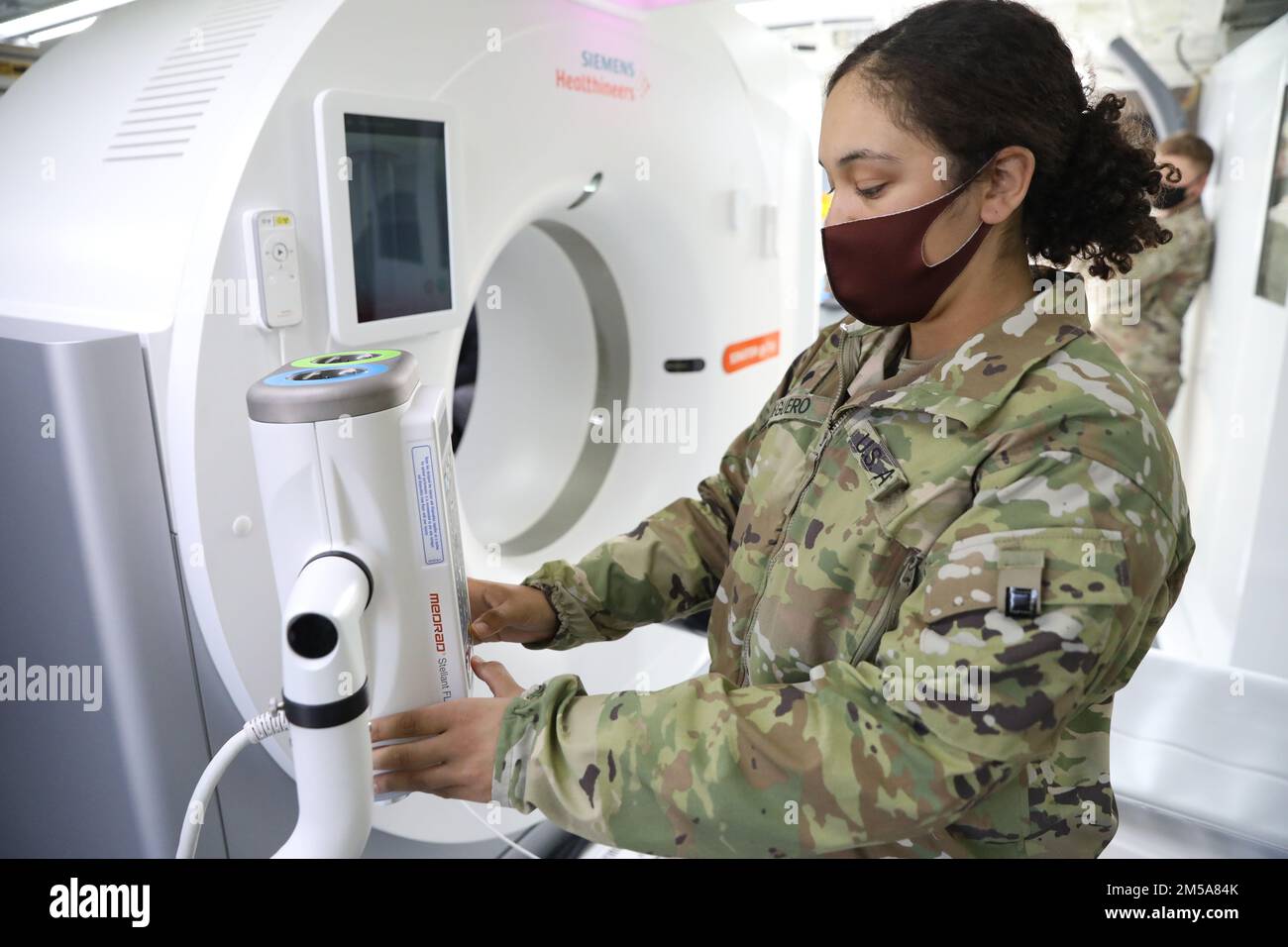 Spc. Eddalys Peguero, a radiology specialist assigned to the 14th ...
