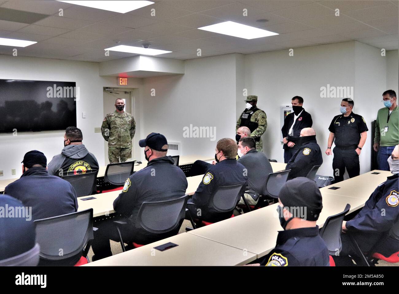 Garrison Commander Col. Michael Poss and Deputy to the Garrison ...
