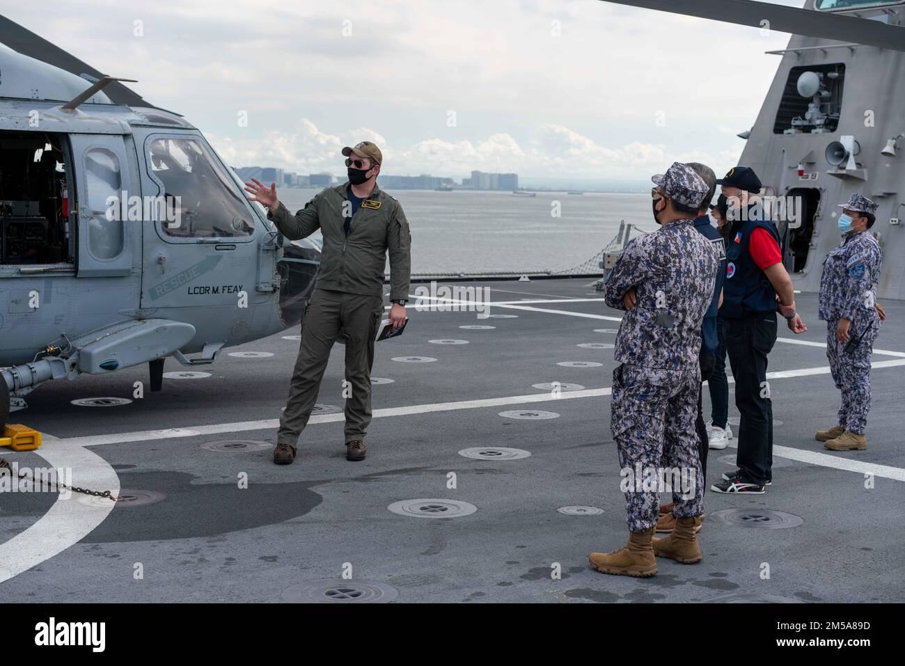 220215-N-FA490-1328 MANILA, Philippines (Feb. 15, 2022) – Lt. Garrett ...